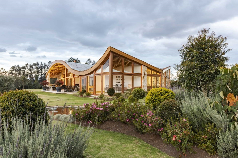 Modern Wooden House with Wavy Roof - Dream Home Designing